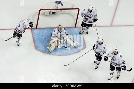 Edmonton Oilers' Michael Peca scores a goal past San Jose Sharks goalie ...