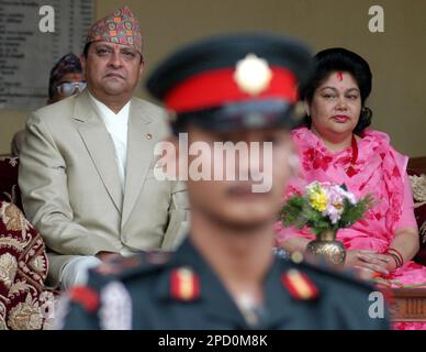Nepal's King Gyanendra, right, and Queen Komal, offer prayers at ...