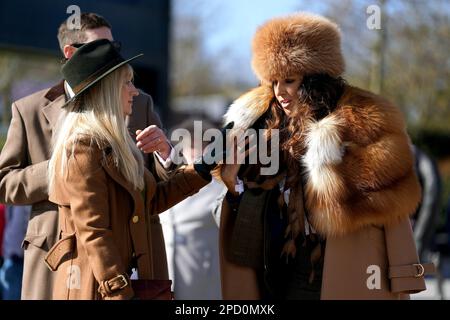 Racegoers arriving on day one of the 2024 Cheltenham Festival at ...