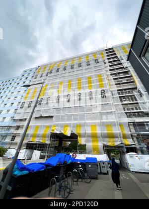 An HLM building in France, with a balcony and wall covered by barbed ...