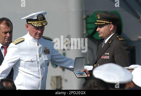 Srecko Herzeg, a descendant of WW2 hero Peter Tomich, salutes during ...