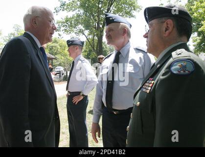 From left to right: Maj. Michael Tomlin, brigade operations officer ...