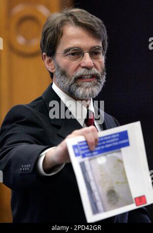 Assistant Lucas County Prosecutor Dean Mandros, left, questions witness ...
