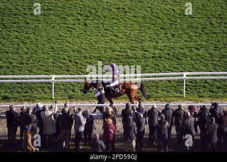Corach Rambler ridden by jockey Derek Fox head back in after winning ...
