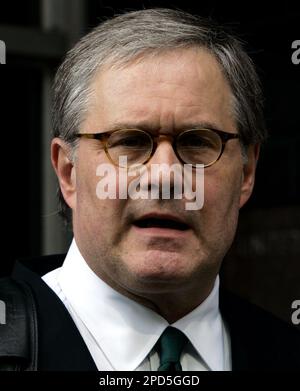 Defense attorney George "Mac" Secrest arrives at the courthouse for ...