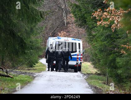 Freudenberg, Germany. 14th Mar, 2023. Flowers and candles were laid at ...