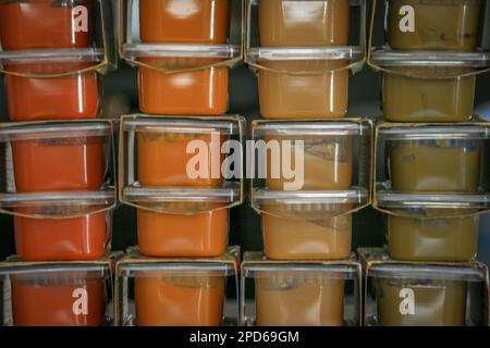 Stacks of different flavored baby food Stock Photo - Alamy