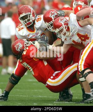 Iowa State's Stevie Hicks, left, runs from Kansas State defender Jesse ...