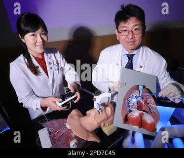 Dr. Rainbow Lau Wing-hung (left), Clinical Assistant Professor ...