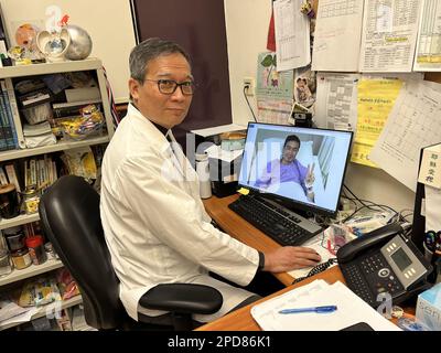 Reverend Simon Tse Yiu-yeung, a Sars survivor, was looking at the photo ...