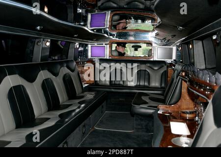 Tyler Lehmann, owner of Blackstone Limousine, is shown in one of two of ...