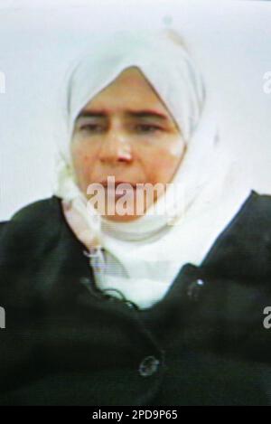Iraqi Sajida Mubarek Atrous al-Rishawi is seen wearing an explosive ...