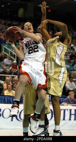 Georgia Tech's Janie Mitchell (21) has her shot blocked by Miami's ...