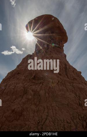 Sunburst coming off edge of rock formation Stock Photo - Alamy