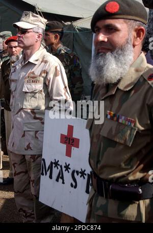 U.S. Army Lt. Col. Kenneth Snow works with his Jordanian Armed Forces ...