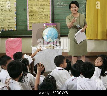 In this photo released by Malacanang Palace Presidential Communications ...