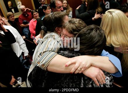 Trena Gage, mother of Jetseta Gage, left, wipes away a tear as she ...