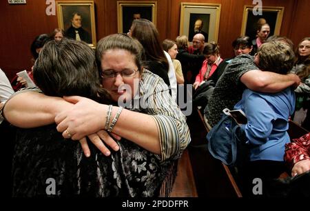 Trena Gage, left, mother of Jetseta Gage, 10, wipes away tears while ...