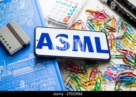 In this photo illustration, the ASML logo is seen displayed on a ...