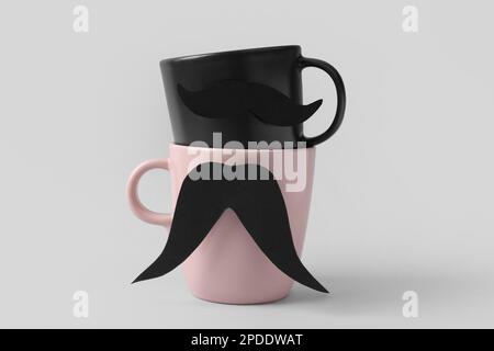 Cups with paper mustache on grey background Stock Photo - Alamy