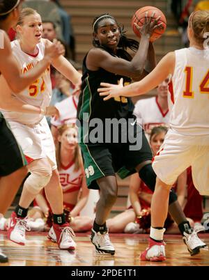 Iowa State's Lyndsey Medders, center, drives between Wisconsin-Green ...