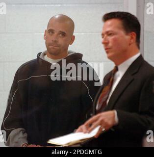 Raymond Lee Jennings, left appears with public defender John Henderson ...