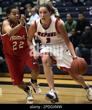 DePaul guard Jenna Rubino, right, goes up for a shot past Cincinnati ...