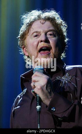 Mick Hucknall lead singer of Simply Red in Concert Stock Photo - Alamy