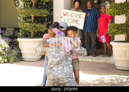 Happy african american soldier wearing military uniform and his wife ...