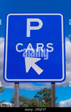 Australian car parking sign with arrow and direction on a blue ...