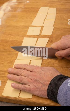 Production of homemade pasta - italian noodles in diy - Close-up of ...