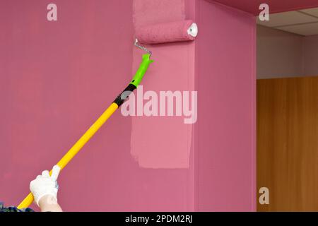 Woman using tube color at home Stock Photo - Alamy