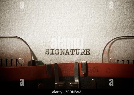 Signature word written with a typewriter Stock Photo - Alamy