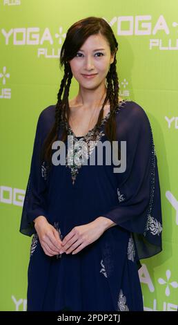 Hong Kong actress Michelle Monique Reis (R) and actor Aaron Kwok (L ...