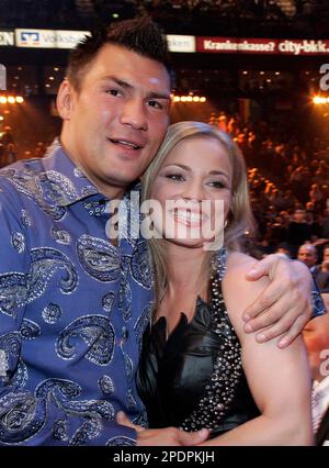 Former boxing champion Dariusz Michalczewski and his son Nicolas arrive ...
