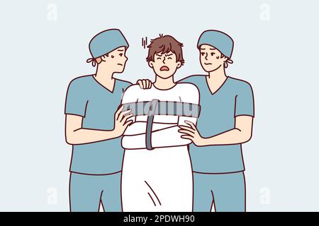 Male admitted patient in hospital gown with a smile facing forward ...