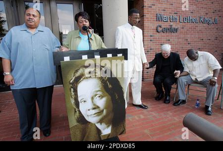 Mrs. Coretta Scott King, left, boards a chartered airliner in Atlanta ...
