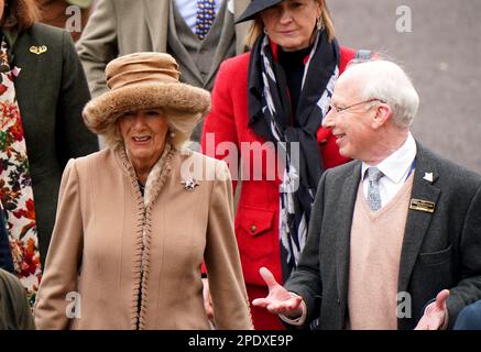 The Queen Consort, with Ian Renton, as she arrives at the Cheltenham ...