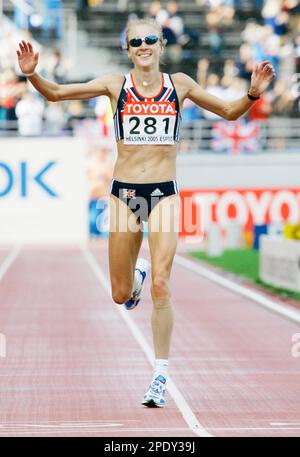 Britain's Paula Radcliffe reaches the line to win the gold medal in the ...
