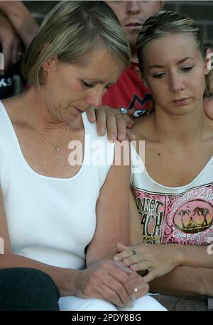 Sally Lambson, mother of Jennifer Hyatte, sits with her husband and ...