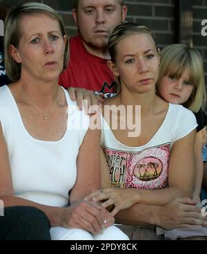 Sally Lambson, left, mother of Jennifer Forsyth Hyatte holds back tears ...
