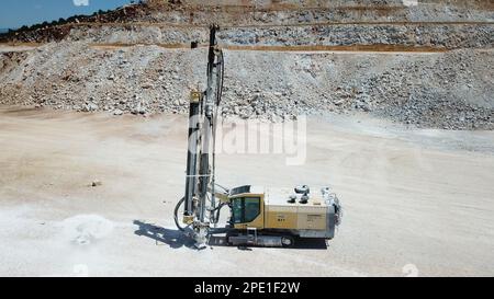 Drilling Machines Working At A Limestone Quarry Stock Photo - Alamy