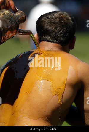 Wrestlers Turkish pehlivan at the competition in traditional Kirkpinar ...