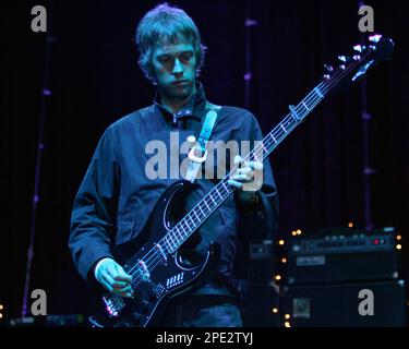 Andy Bell the bassist for the rock band Oasis, with his wife Shiarra ...