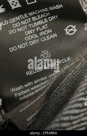 Polyester clothes wash care instructions label, England, UK Stock Photo ...