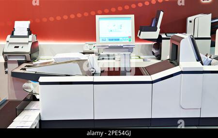 Modern mailing systems in office Stock Photo - Alamy