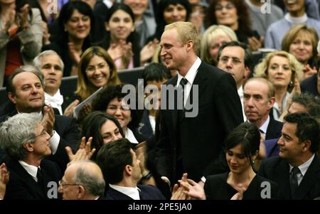 Piotr Adamczyk, standing, a Polish actor who plays the young Pope John ...