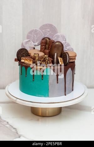 Delicious two-sided homemade birthday cake made in green and grey ...