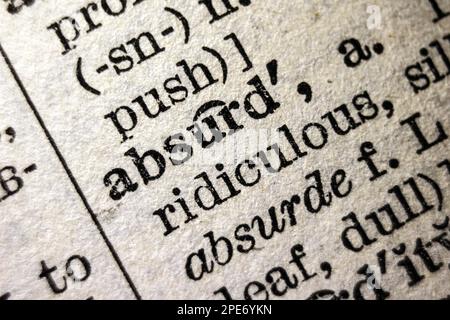 Definition of word absurd on dictionary page, close-up Stock Photo - Alamy