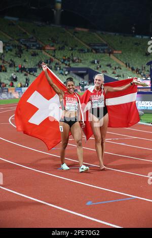 Mujinga KAMBUNDJI & Ida KARSTOFT with National Flags after the 200m ...